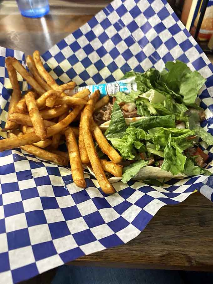 When barbecue meets tacos, magic happens, especially with that perfectly grilled tortilla and generous pile of smoked pork.