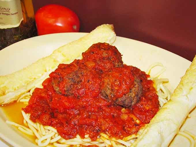 Classic spaghetti and meatballs that would make your Italian grandmother nod approvingly, or at least stop complaining for a minute.
