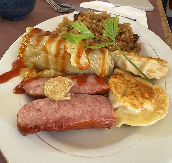 A feast fit for royalty &ndash; golabki drizzled with sauce, pierogi with golden edges, and kielbasa that would make any Polish grandmother proud.