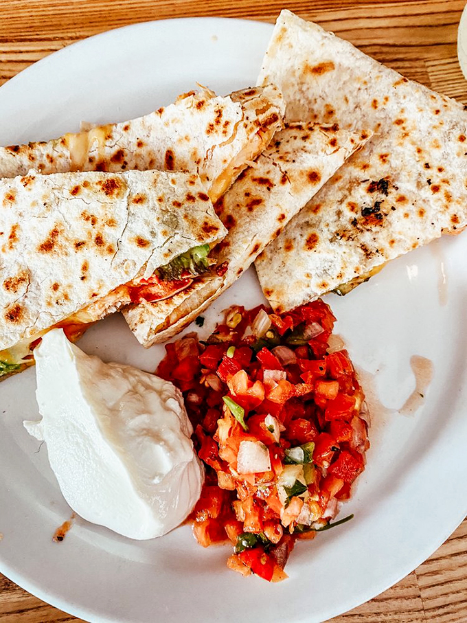 Who knew a quesadilla could transport you straight to flavor town? This cheesy wonder is like a warm, edible hug for your taste buds.