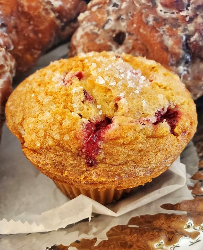 A raspberry muffin bursting with fruit &ndash; proof that Congdon's mastery extends well beyond their famous doughnuts to all baked goods.