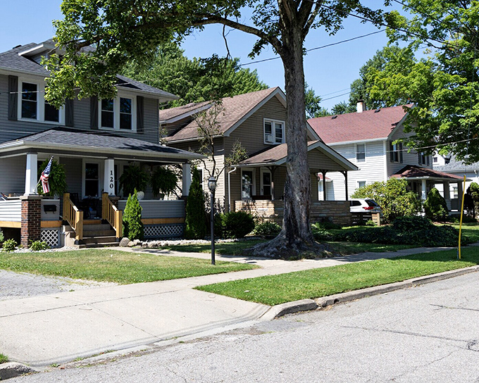 These quiet residential streets offer what many of us secretly crave: neighbors who wave, trees that shade, and pace that soothes.