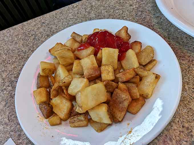 Breakfast potatoes achieving that crispy-tender sweet spot that makes morning people out of night owls everywhere.
