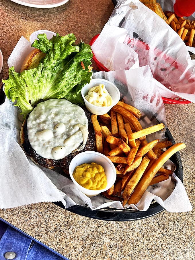This isn't just a burger &ndash; it's a hand-formed masterpiece topped with cheese and nestled alongside fries that were potatoes just moments ago.