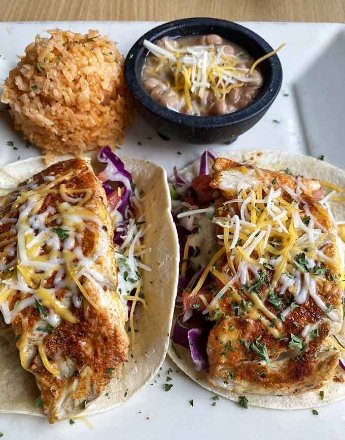 The Carnitas Chile Verde proves that pork and green sauce are a match made in culinary heaven, like peanut butter and jelly for adults.