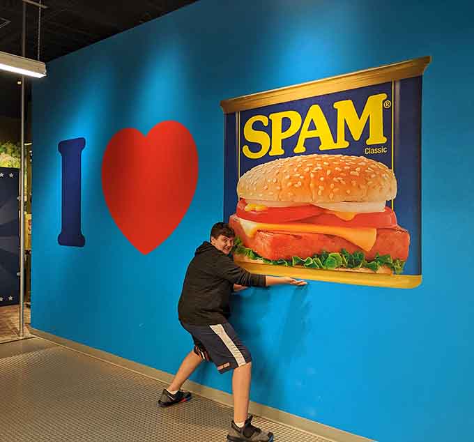 Visitors embrace the giant SPAM&reg; can photo op, because if you can't hug your food, what's the point of living?