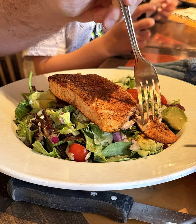 Ford's Signature burger with mac and cheese &ndash; because sometimes you need comfort food that hugs your soul like a vintage leather car seat.