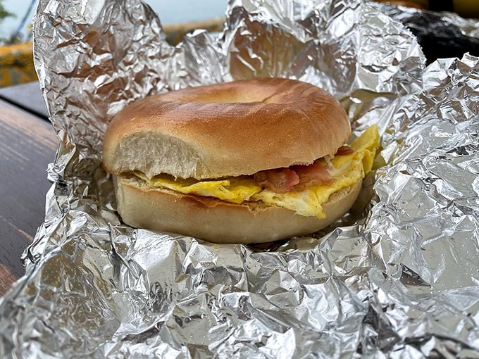 Sunshine on a sandwich &ndash; the vibrant yellow of a fresh egg yolk peeks through, promising to transform an ordinary morning into something special.