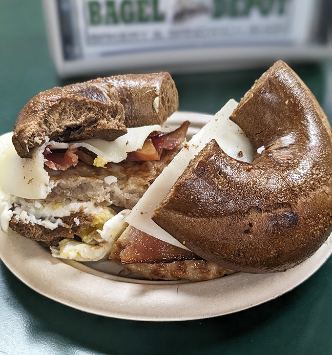 Sausage Egg and Cheese Sandwich: The holy trinity of breakfast – savory sausage, fluffy eggs, and melted cheese nestled in a pumpernickel embrace. Morning fuel at its finest.