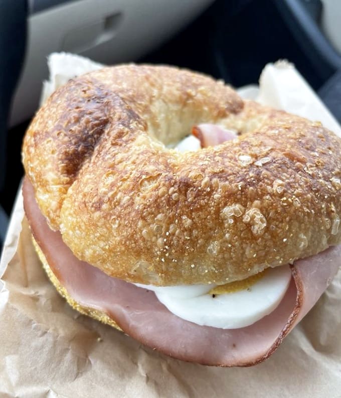 When your breakfast bagel is this perfectly golden and generously filled, you know someone in that kitchen really understands what morning should taste like.