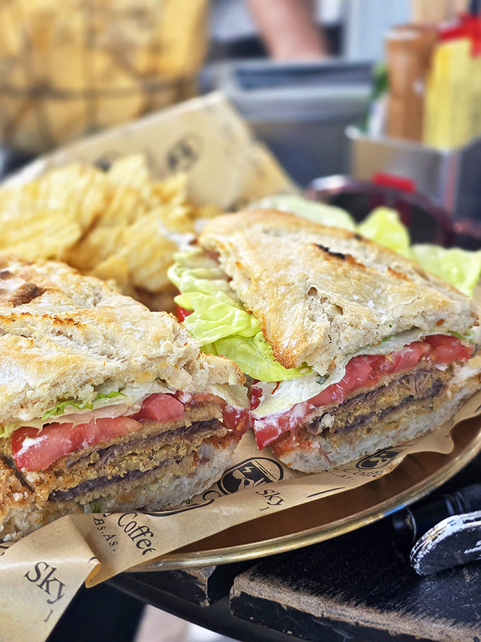 Layers of fresh ingredients nestled between perfectly toasted bread make this sandwich worth traveling across town for &ndash; no frequent flyer miles required.