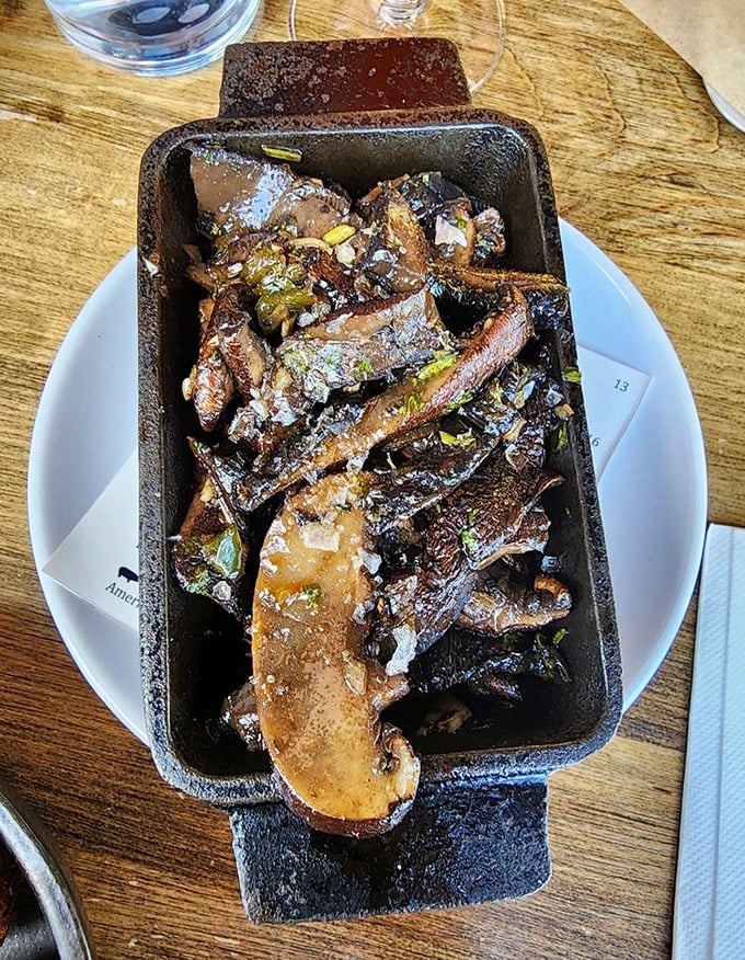 These aren't just mushrooms; they're umami bombs that have undergone a smoky transformation in cast iron, emerging as meaty, rich side dishes that frequently steal the spotlight.