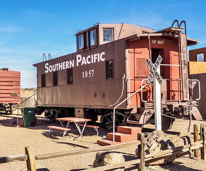 This Southern Pacific caboose has seen more miles than most modern travelers, now resting its wheels while sharing tales of the rails.