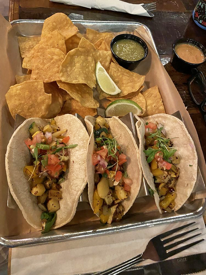 Veggie tacos that could convert carnivores, fresh, vibrant, and bursting with flavors that dance across your palate like happy little vegetables.