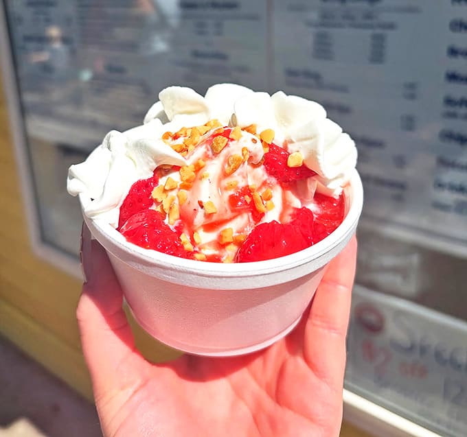 Strawberry Sundae: Ruby-red berries playing hide-and-seek with vanilla soft serve. A drizzle of strawberry sauce completes this ode to summer's sweetest fruit.