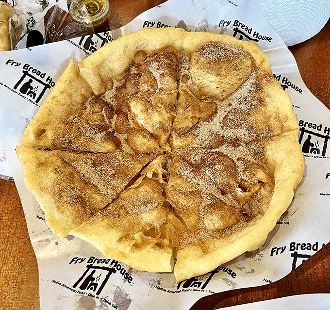Dessert perfection: golden fry bread dusted with cinnamon and sugar creates a simple yet transcendent sweet ending.