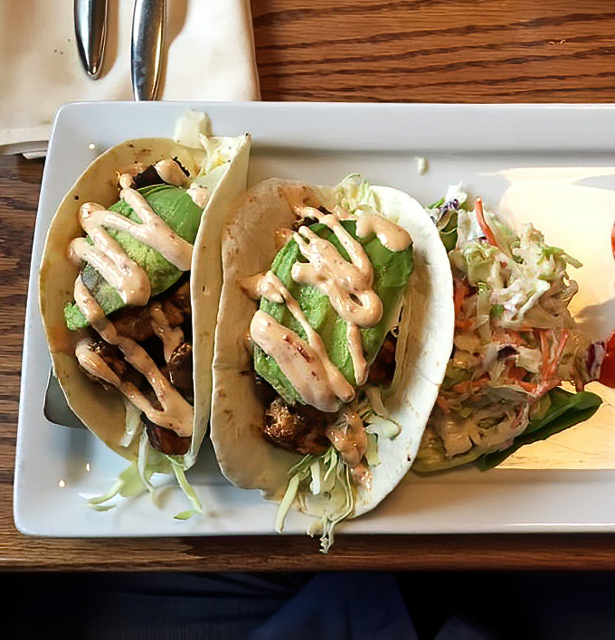 Fish tacos done right: Crispy yet tender fish, fresh avocado, and a zesty sauce that brings everything together in perfect harmony.