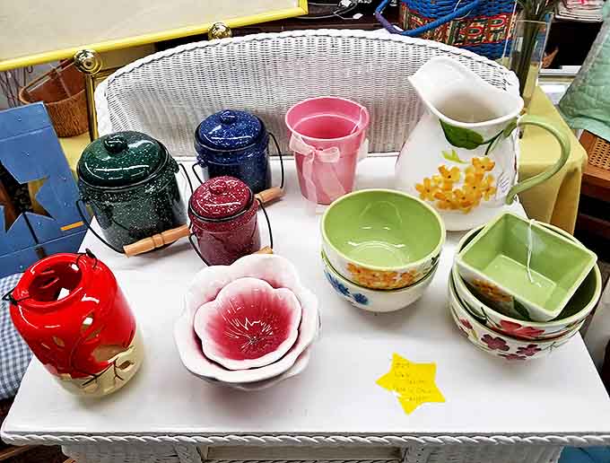 A rainbow of vintage pottery and kitchenware – these aren't just dishes, they're time capsules from grandma's kitchen ready for new adventures.