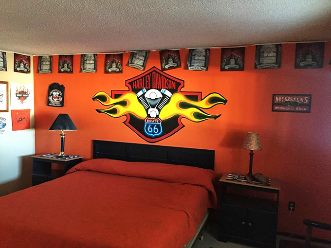 Orange you glad you booked this room? It's like sleeping inside a sunset, with a side of biker cool.