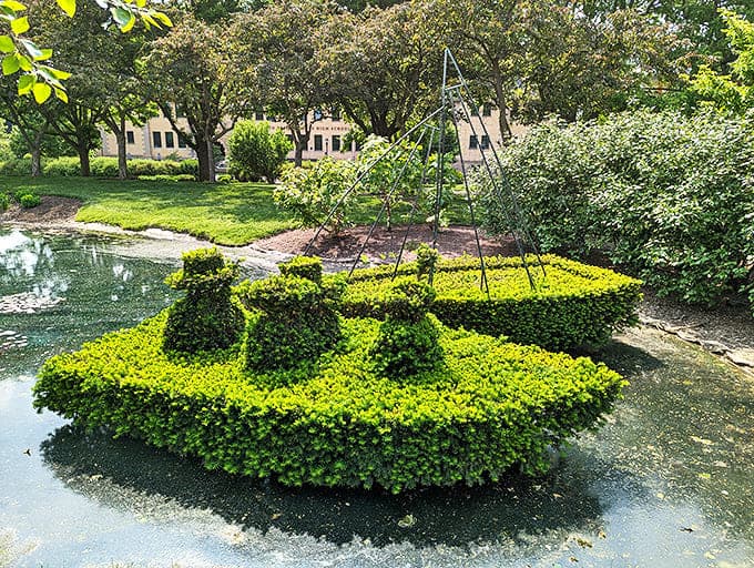 This isn't just any boat &ndash; it's a vessel made entirely of carefully trimmed shrubs, sailing on a pond of imagination.