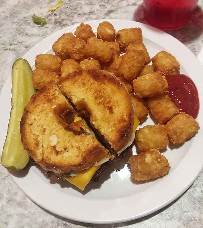 The donut burger takes things to another level, because sometimes regular buns just aren't adventurous enough for your mood.