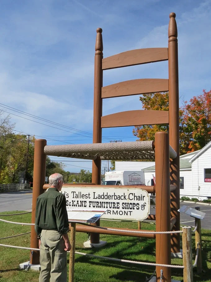 Another visitor contemplates what kind of giant might find this chair just right. Too firm for Goldilocks, perhaps, but perfect for Paul Bunyan after a long day of axe-wielding.
