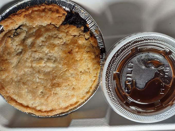 A proper veggie curry pie with its golden dome of pastry sits beside a cup of tea &ndash; proof that British cuisine offers more than meat and potatoes.
