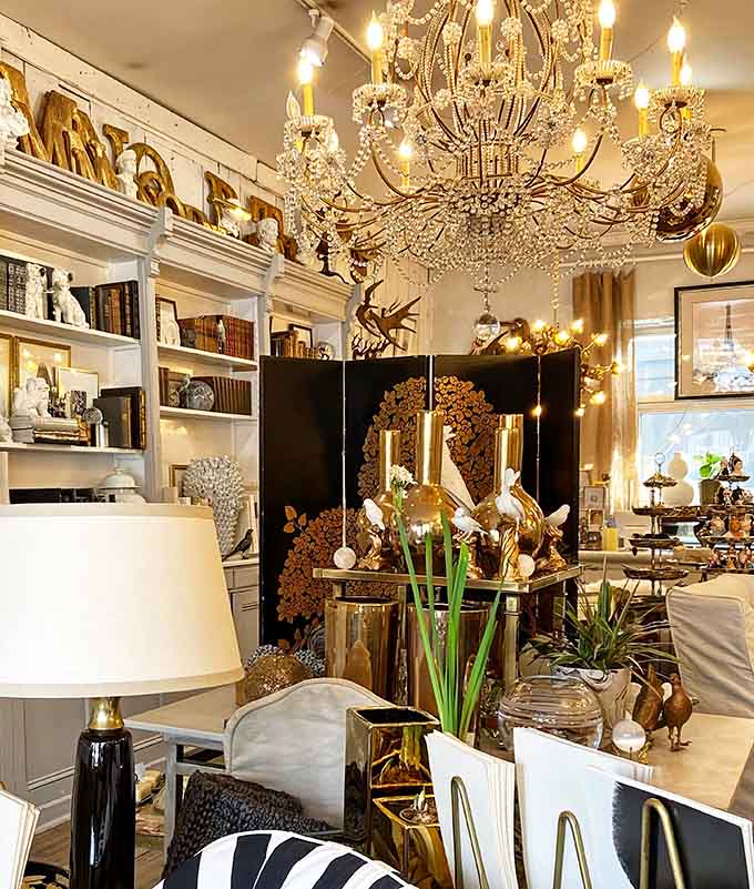 That chandelier catches light like a disco ball's sophisticated older sister, transforming ordinary shopping into an experience worthy of evening wear.
