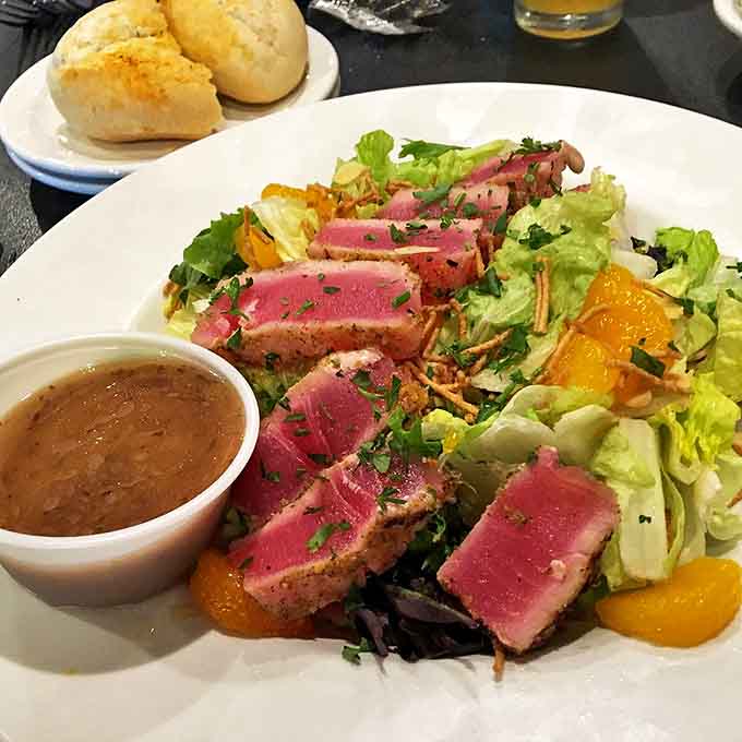 The Ahi Tuna Salad brings the ocean to Michigan with perfectly seared tuna, mandarin oranges, and crunchy elements that dance together.