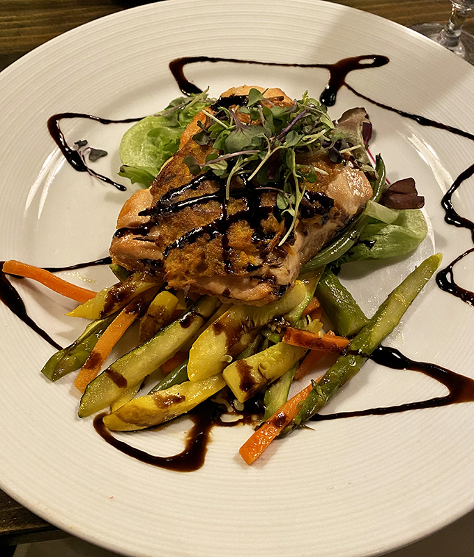 A perfectly grilled steak with vegetables that aren't mere sidekicks but co-stars in this culinary performance.