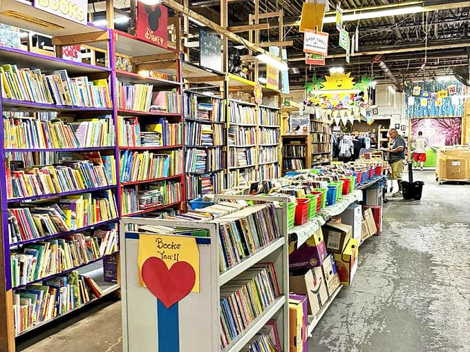 The children's section bursts with color and possibility. Future readers find their first literary loves among these carefully organized shelves.