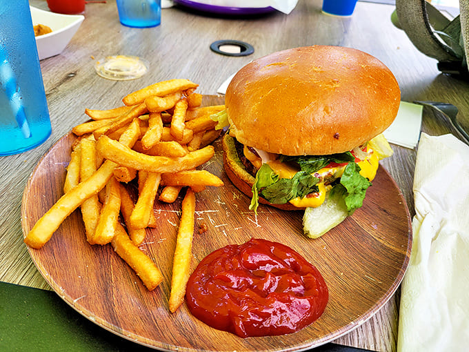 The Beach House Burger arrives like a work of art &ndash; juicy patty, golden bun, and fries so perfect they make ketchup seem almost unnecessary.