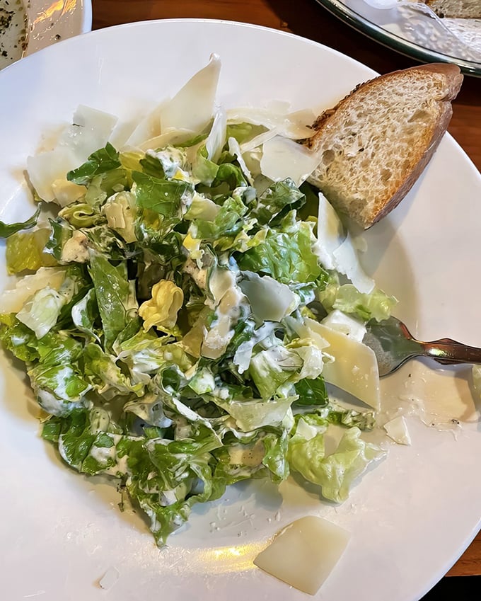 The chef's salad isn't an afterthought but a crisp, refreshing counterpoint with shaved Parmesan and house dressing.