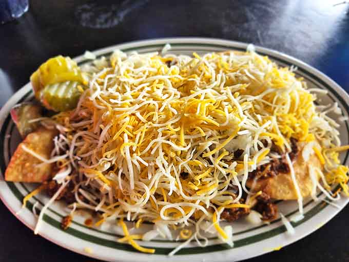 These aren't your ballpark nachos &ndash; they're a mountain of chips buried under an avalanche of chili and cheese that requires strategy to conquer.