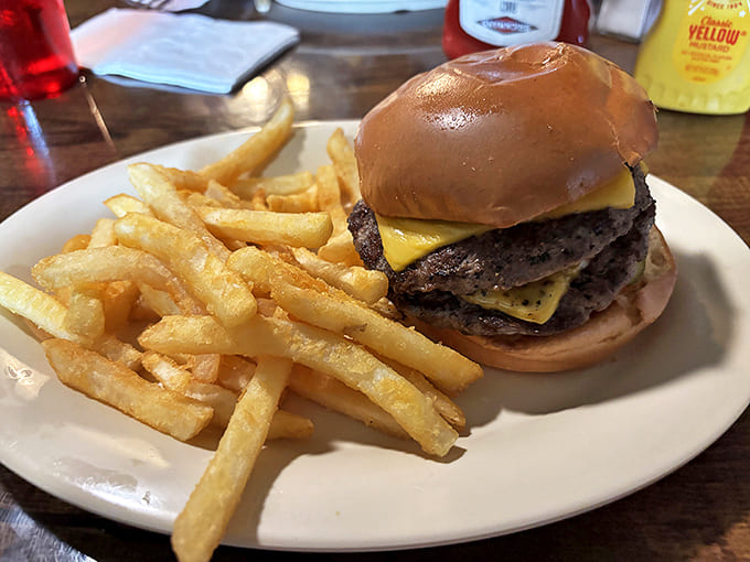 This double cheeseburger isn't messing around—two substantial patties layered with melty cheese demand both hands and your complete attention.