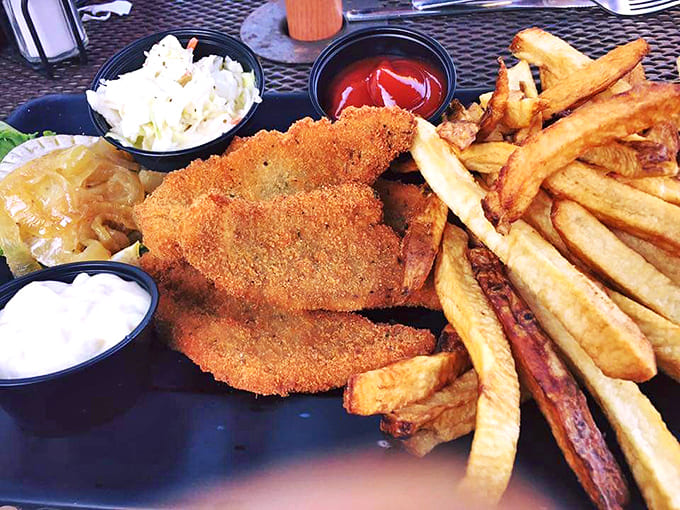 Fish fantasy! Crispy battered perfection with fries so good they'd make a Brit weep with joy. The tartar sauce deserves its own fan club.