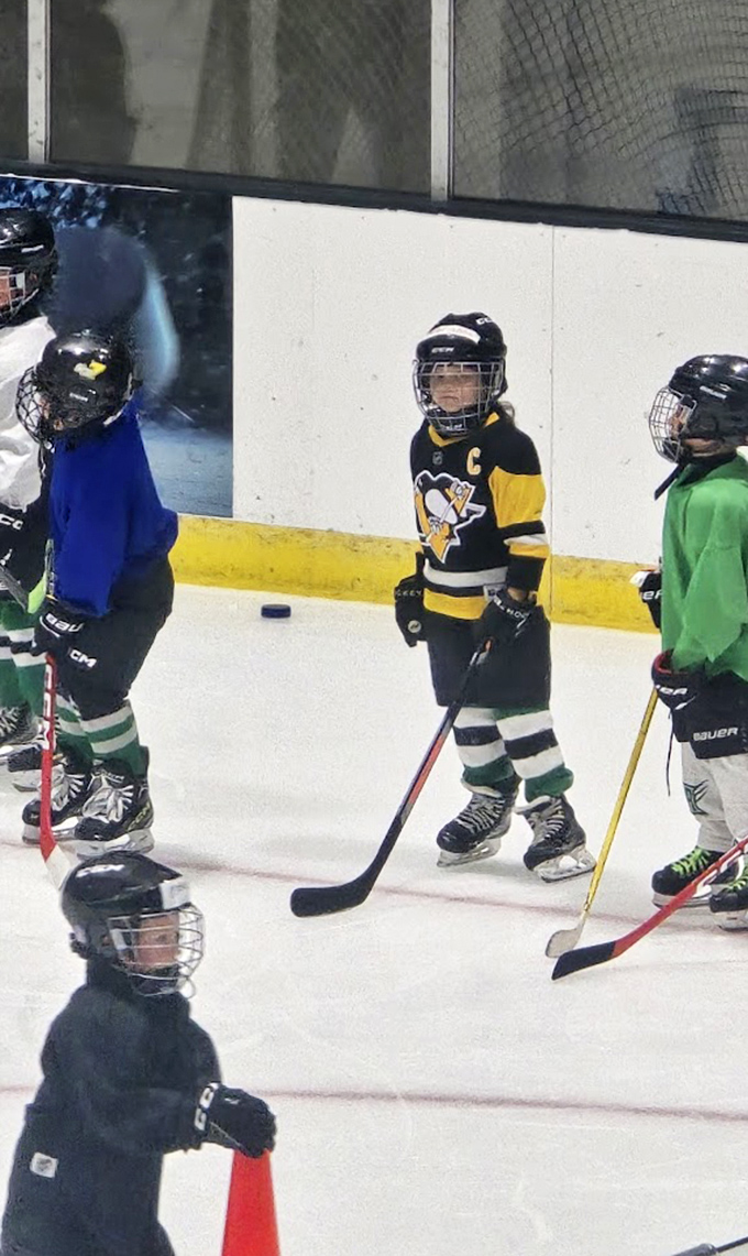 Hockey in its natural habitat: Young players perfect their skills on the same ice where bumper cars later bring the fun.