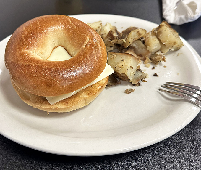 Even a simple bagel breakfast becomes extraordinary at Mae's, where those crispy-outside, tender-inside home fries steal the spotlight every time.