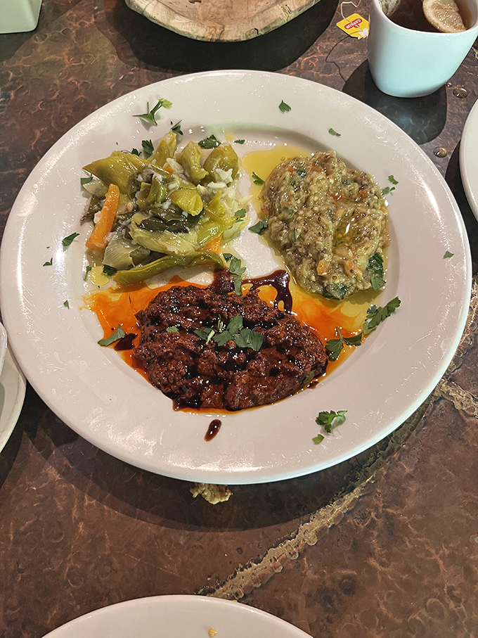 A trio of Turkish delights share the plate in perfect harmony &ndash; the kind of mezze spread that turns first-time visitors into regular patrons.