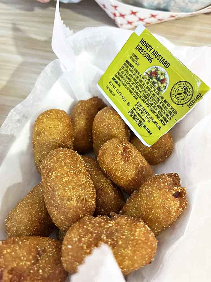 The holy trinity of diner food &ndash; a perfectly melted cheeseburger, golden fries, and a shake thick enough to require serious straw commitment.