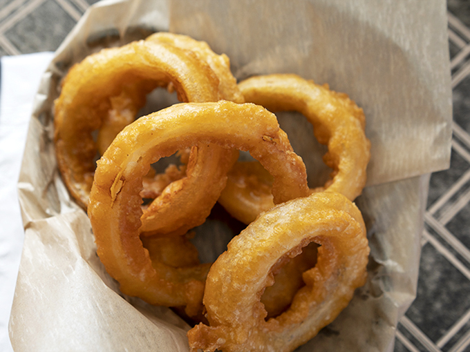 Crispy, golden halos of happiness. These onion rings are so perfect, they deserve their own Renaissance painting.