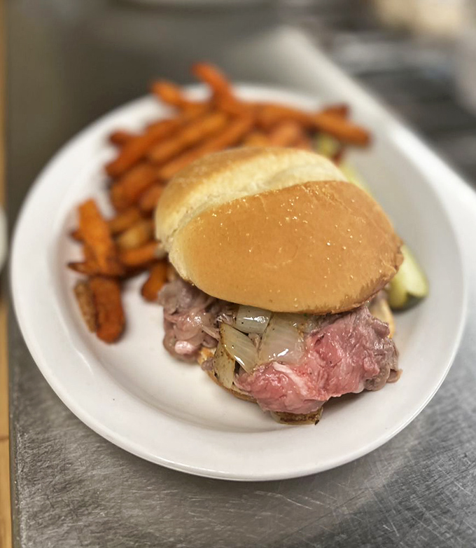 The prime rib sandwich &ndash; tender, juicy beef on a soft roll that makes lunch feel like a special occasion.