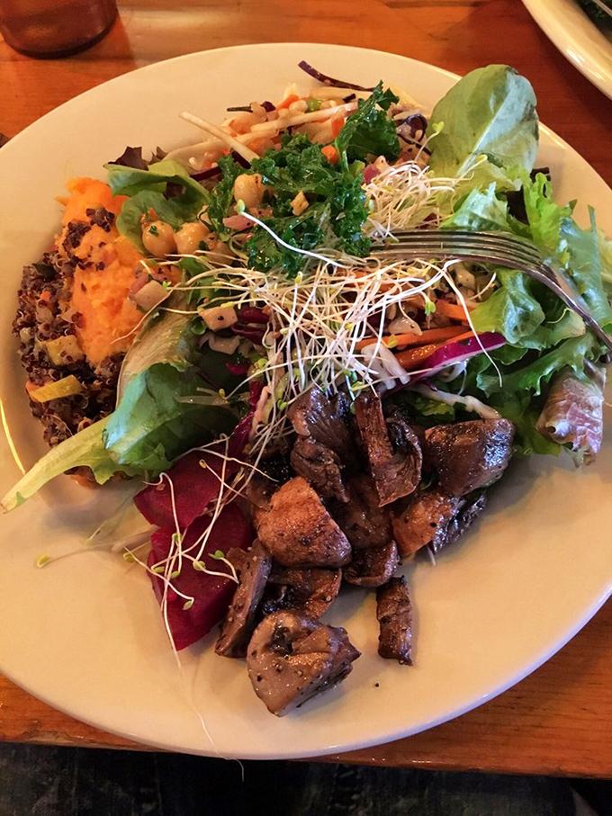 Fresh greens, roasted vegetables, and thoughtful composition elevate Stone Soup's salads from side dish to main event.