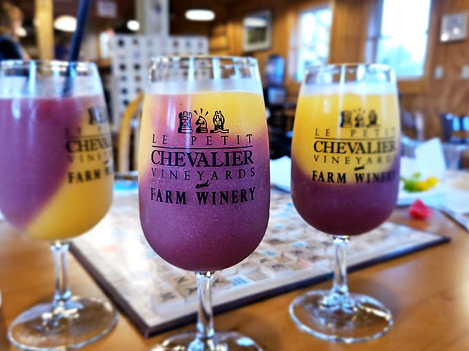 Vibrant wine slushies in gradient colors from sunshine yellow to deep purple promise refreshment with sophistication &ndash; summer's most grown-up frozen treat.