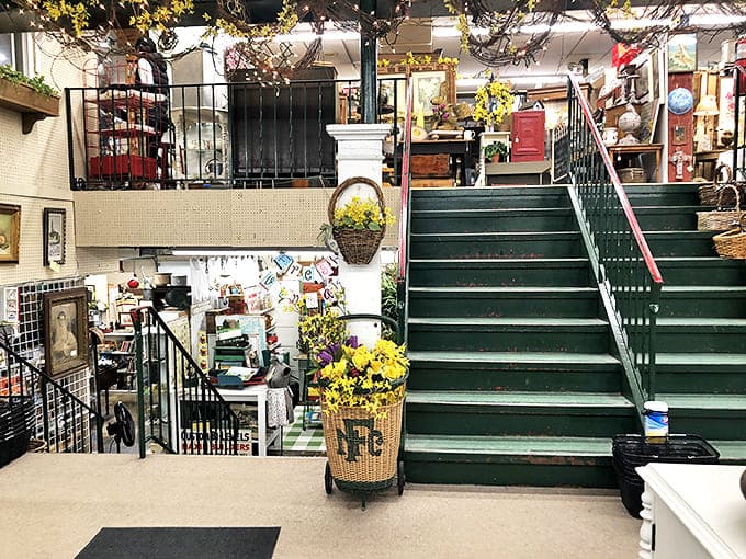 Green stairs beckon explorers to another level of treasures, promising even more vintage wonders for those willing to venture deeper into the past.