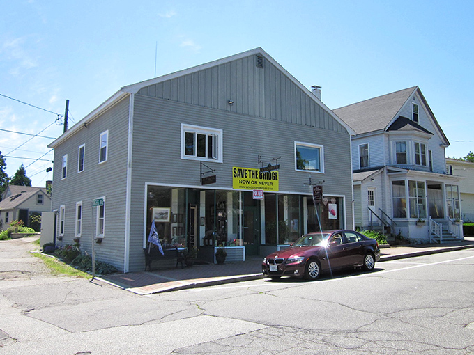 Local shops line Kittery's streets, where "Save the Bridge" signs remind visitors that New Englanders take their infrastructure seriously and personally.