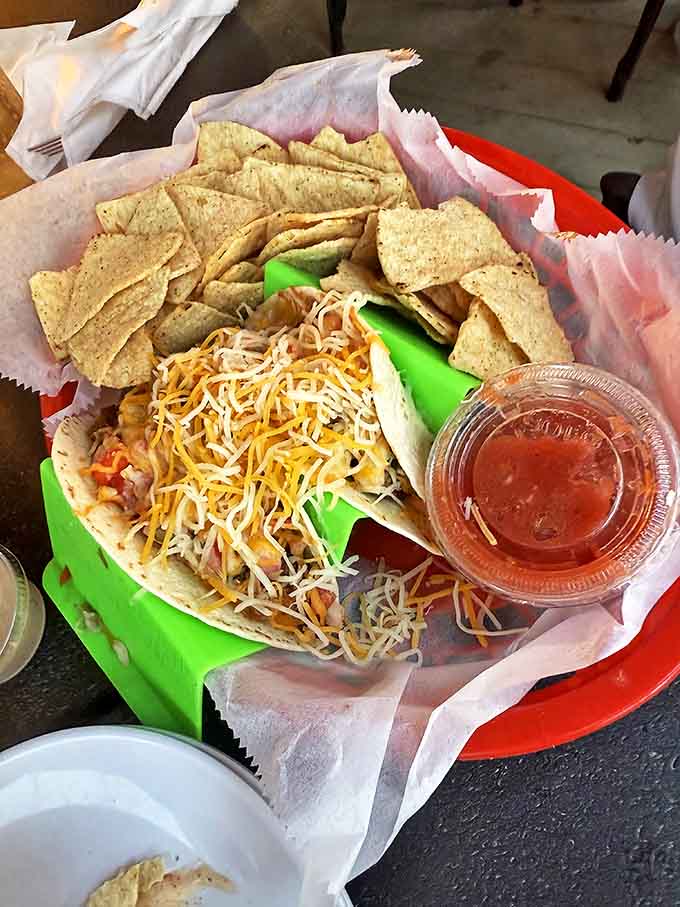 These aren't just tacos &ndash; they're little boats of happiness sailing on a sea of melted cheese and fresh salsa.