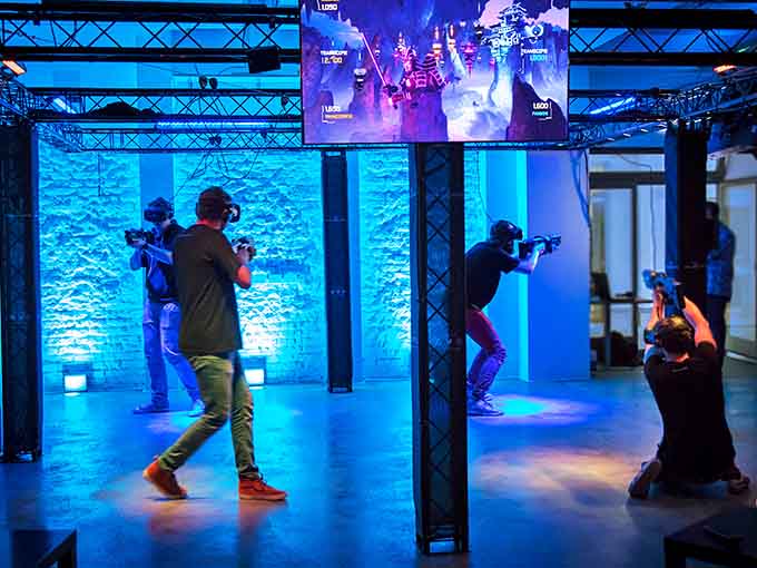 Virtual reality gaming that's so immersive, you'll forget you're actually flailing around in public while onlookers secretly record for their social media.