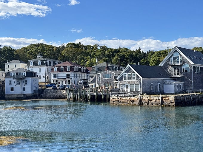 Weathered docks and historic buildings tell stories of Stonington's maritime heritage, where past and present merge seamlessly.