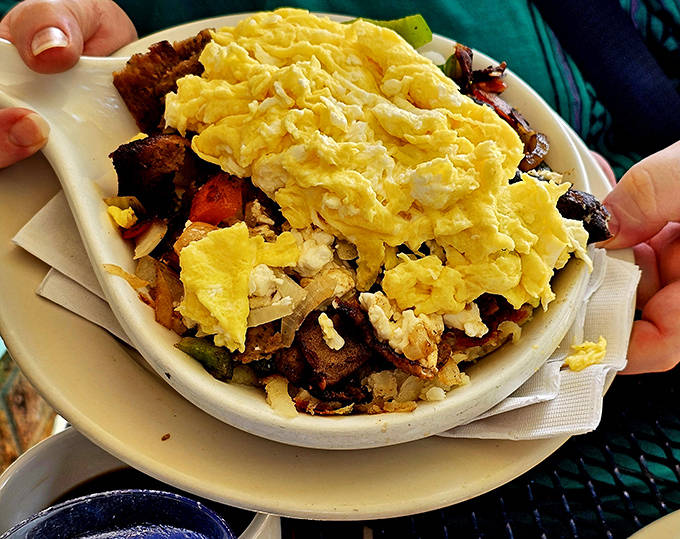 Mediterranean meets Midwest in this Greek-inspired skillet featuring gyro meat, feta cheese, and fresh vegetables atop crispy potatoes.